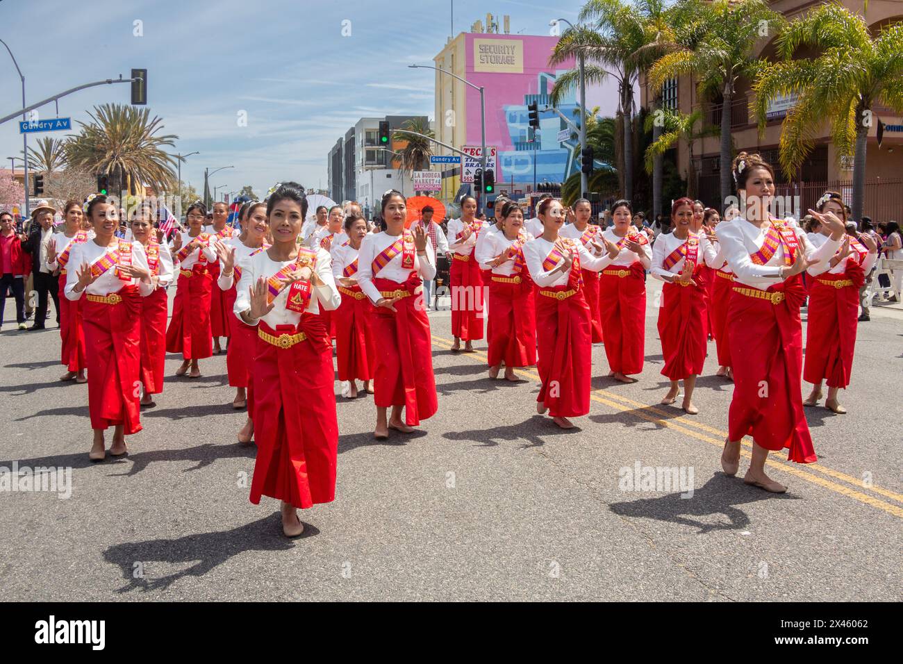Adult Apsara dancers from the Stop the Hate Program walking in the ...