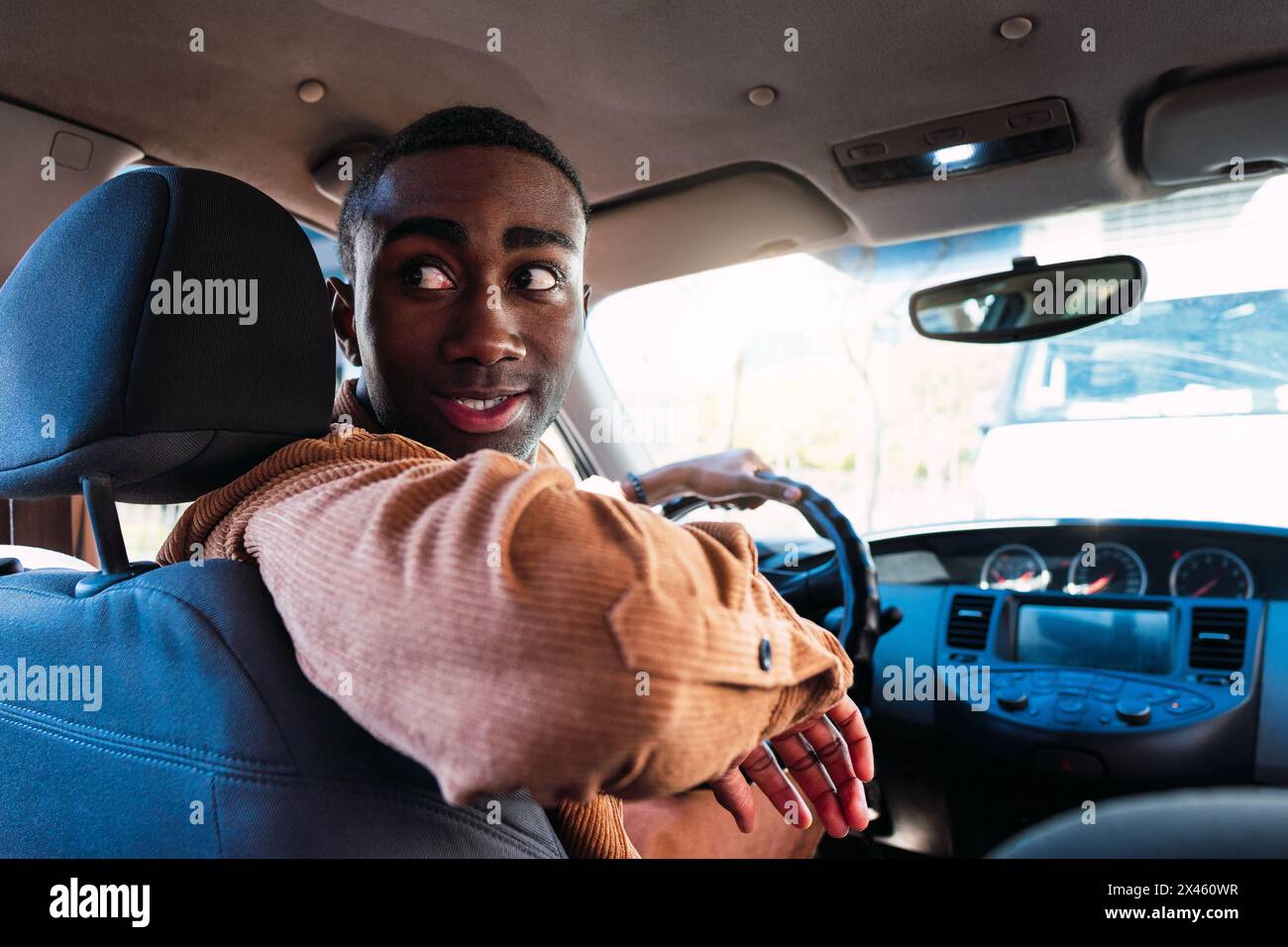 Driver look at back seat hi-res stock photography and images - Alamy