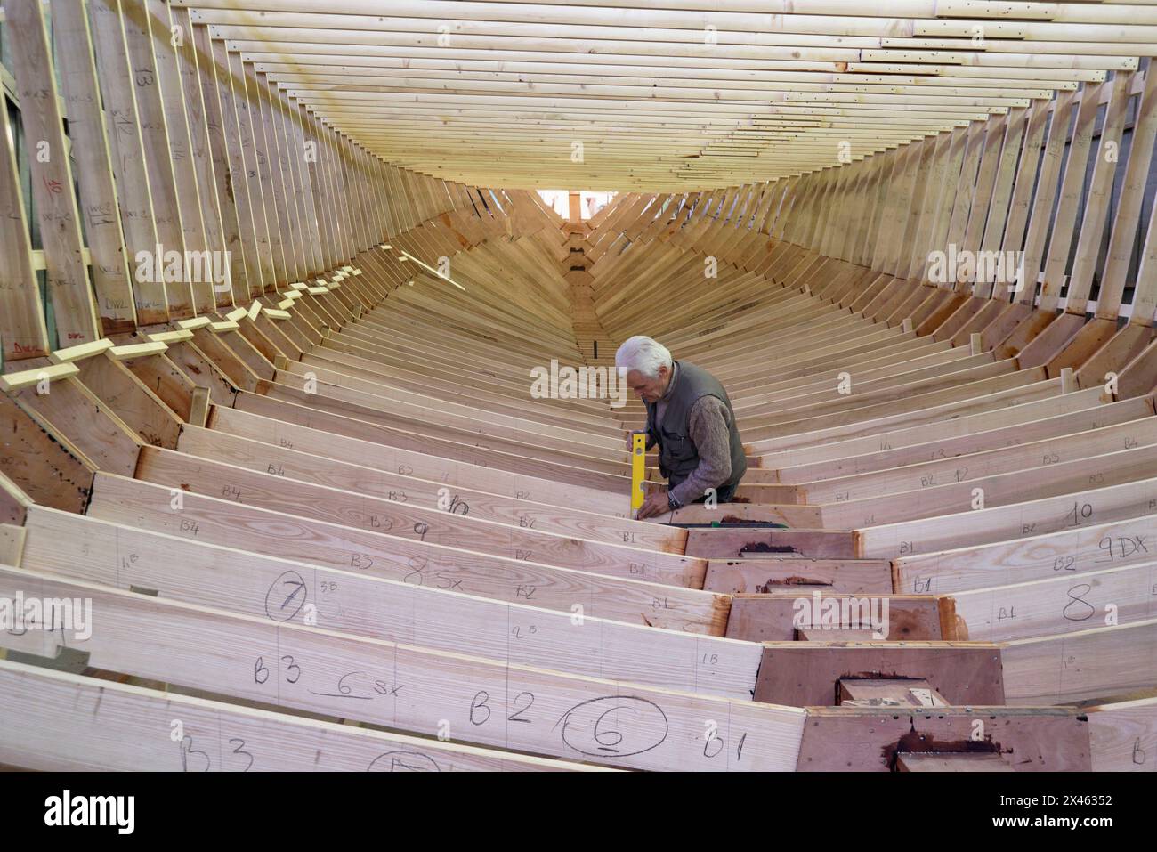 Italy, Fiumicino (Rome), the wooden keel beams of a 35 meters luxury ...