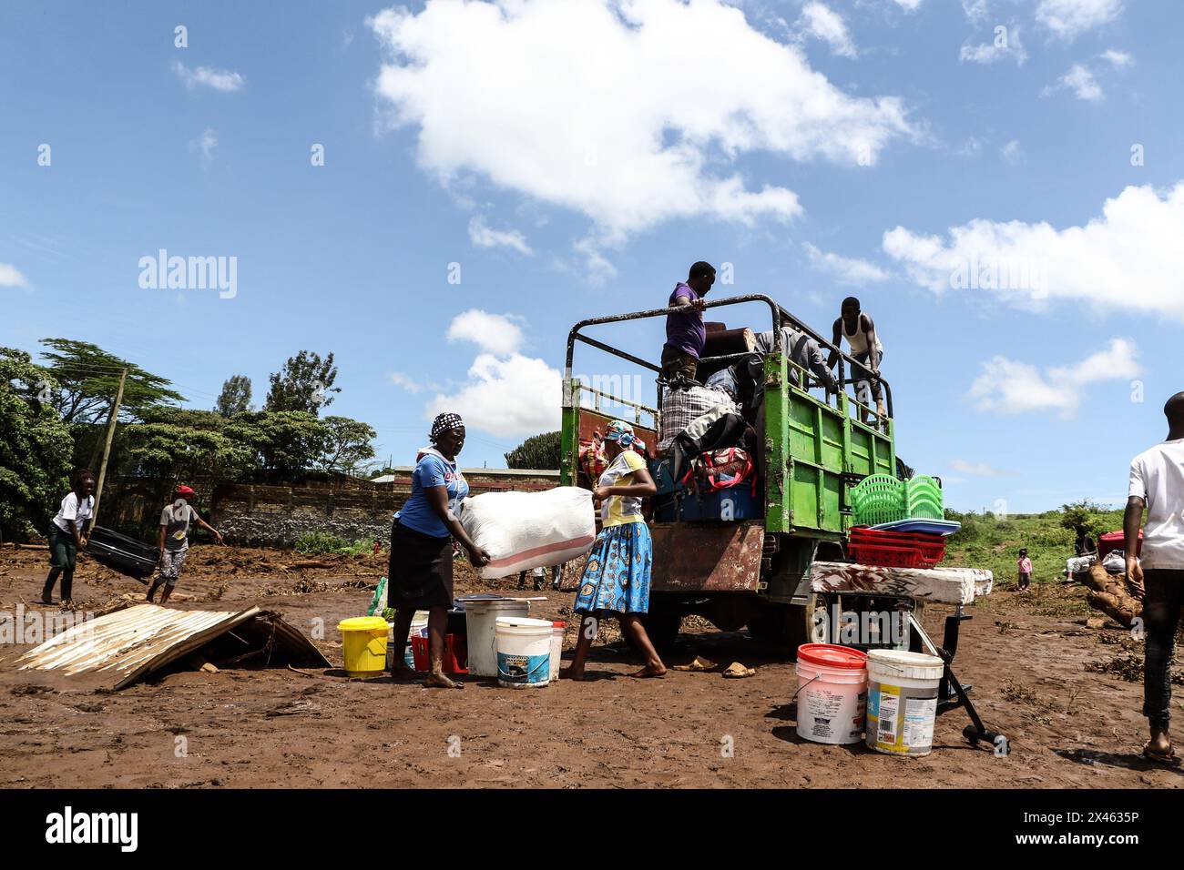 People prepare to move to safer areas with their belongings. More than ...