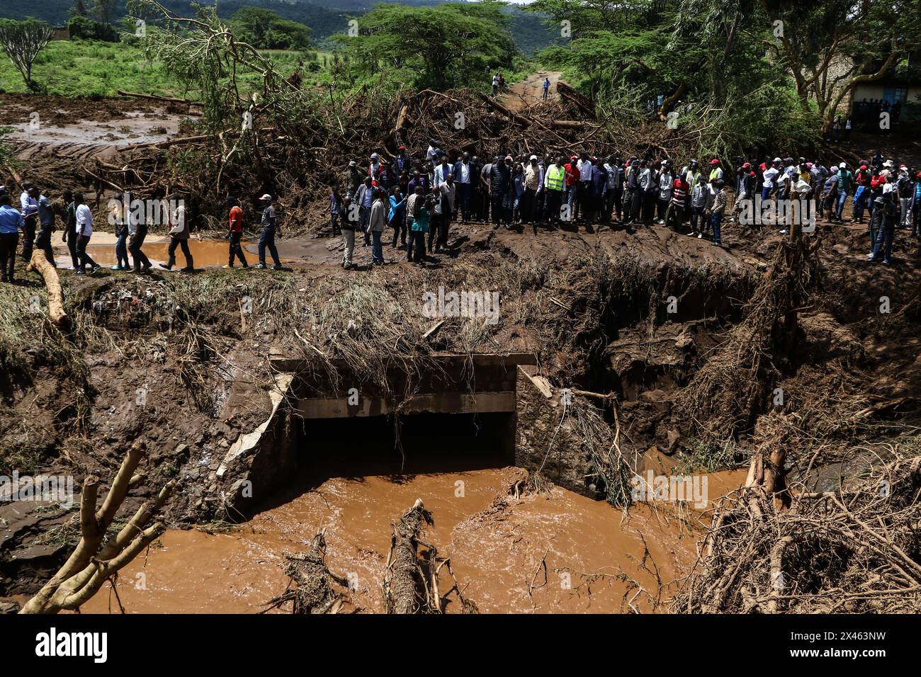 Nakuru, Kenya. 29th Apr, 2024. People gather on a bridge and watch a ...