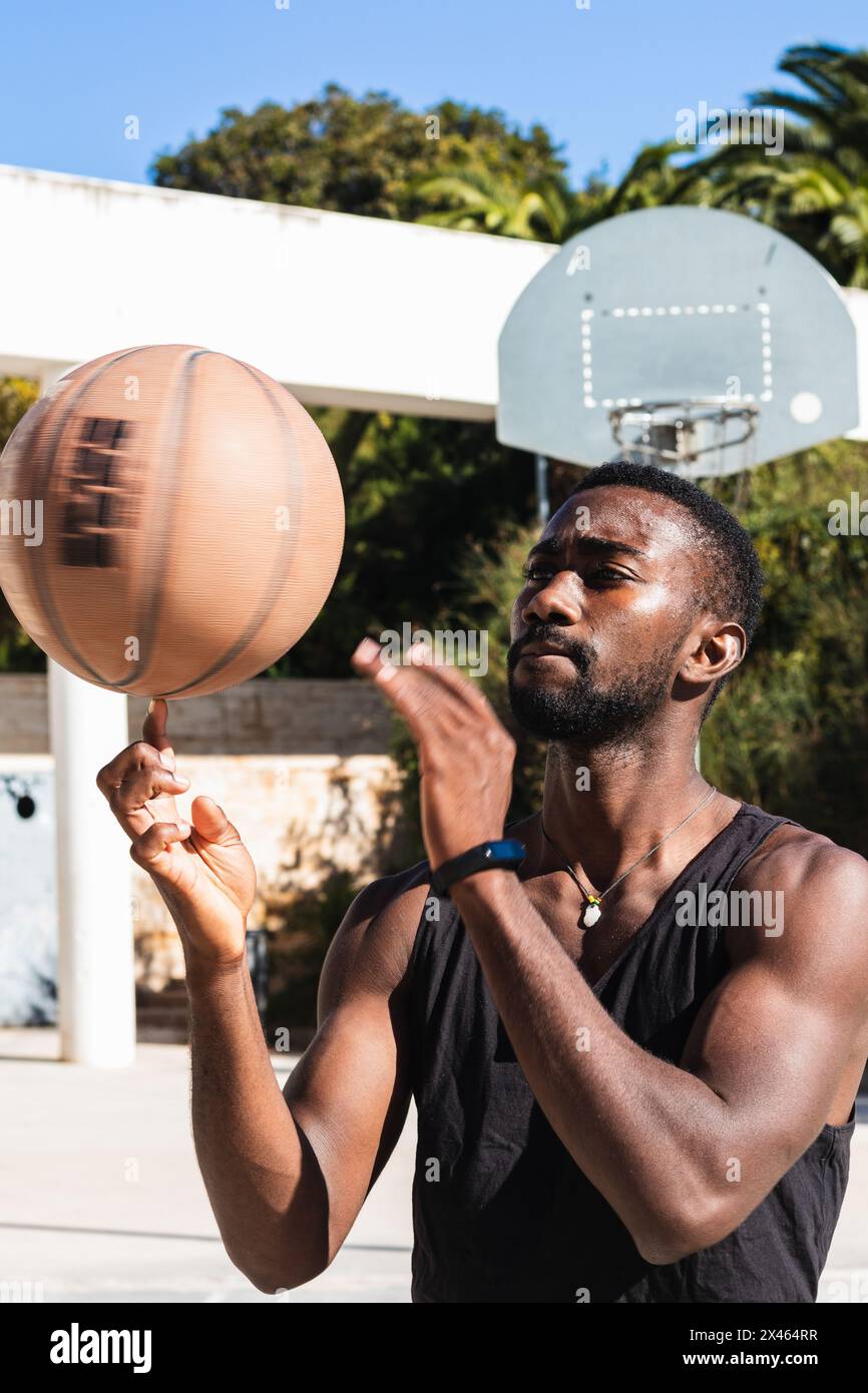 Basketball player spinning ball african hi-res stock photography and ...