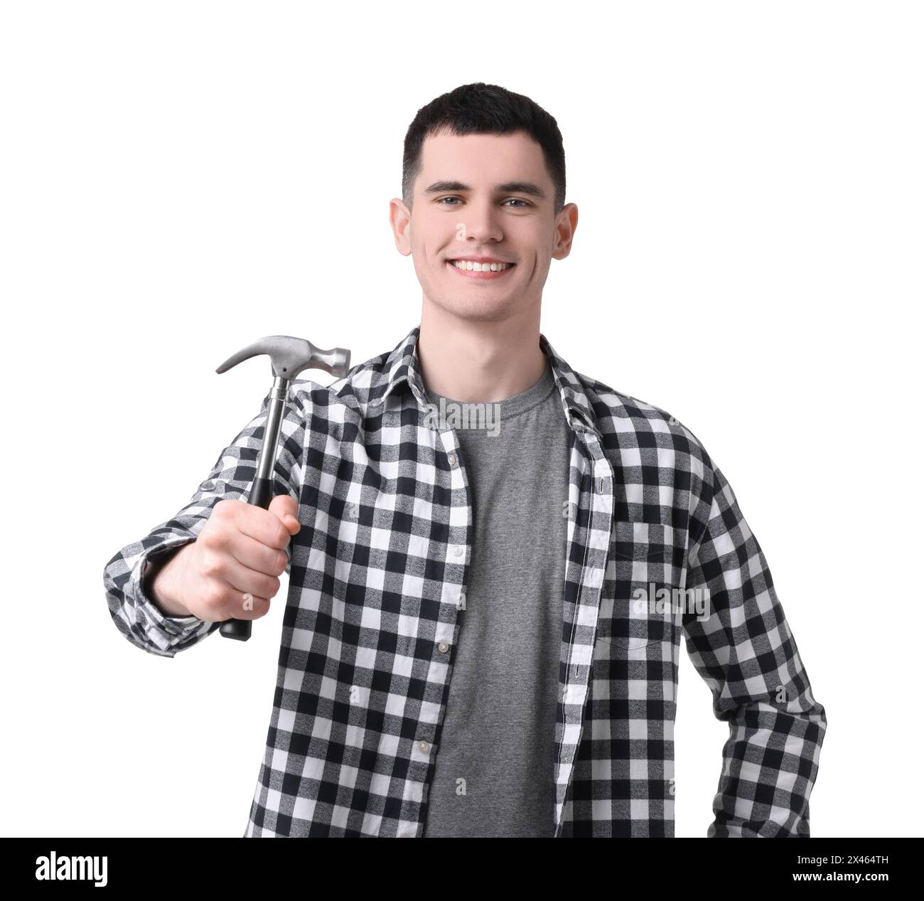 Young man holding hammer on white background Stock Photo - Alamy