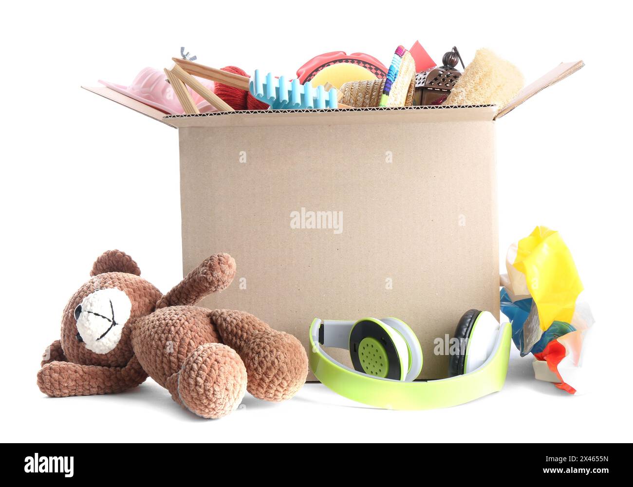 Box of unwanted stuff isolated on white Stock Photo - Alamy