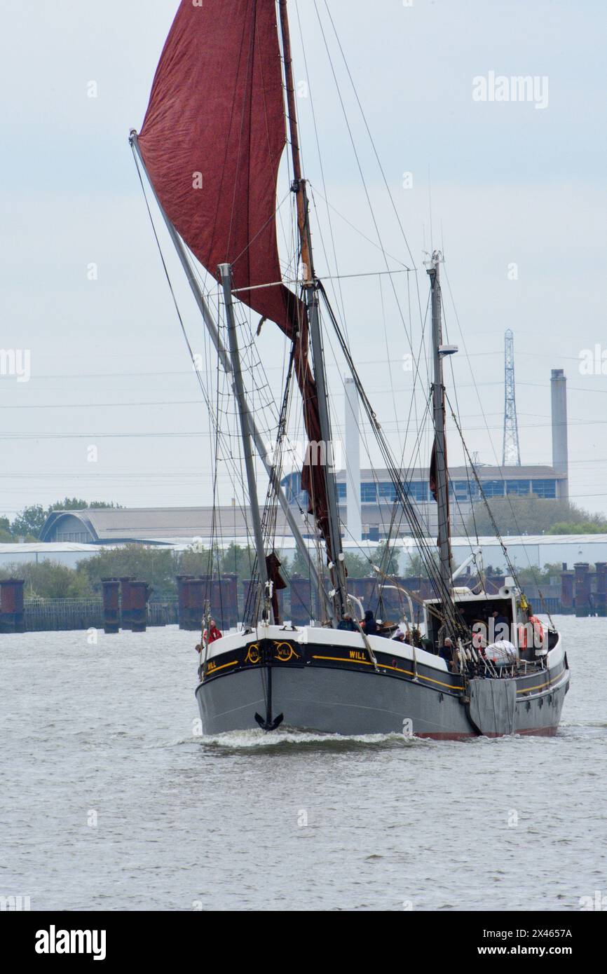 Thames sailing Barge on the river Thames is a flat-bottom barge with ...