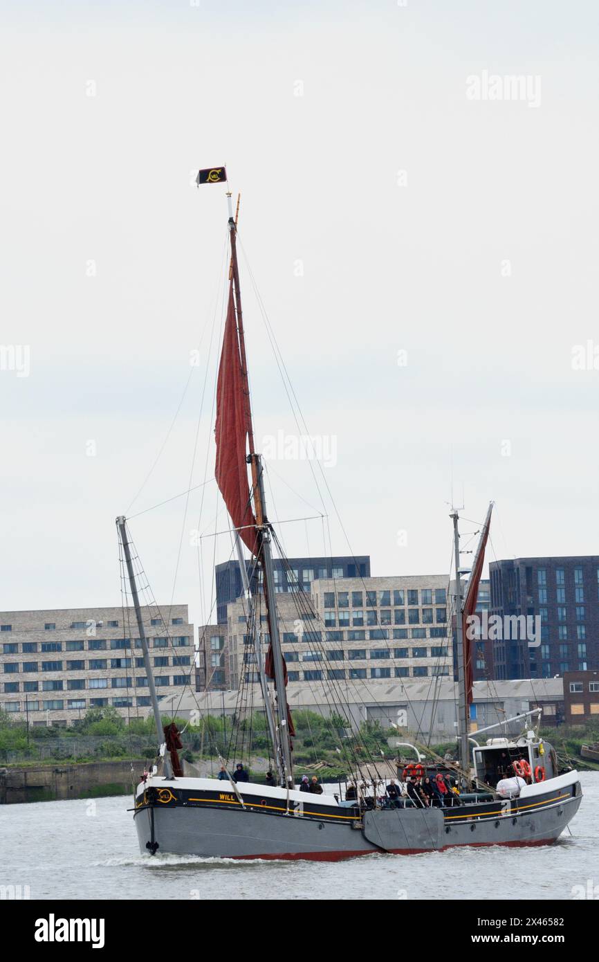 Thames sailing Barge on the river Thames is a flat-bottom barge with ...