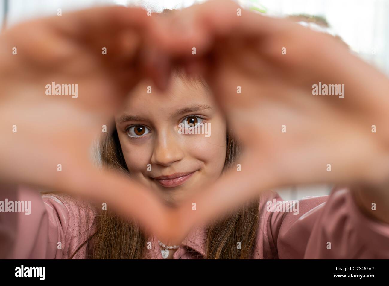 I love you. Caucasian child kid girl makes symbol of love, showing ...