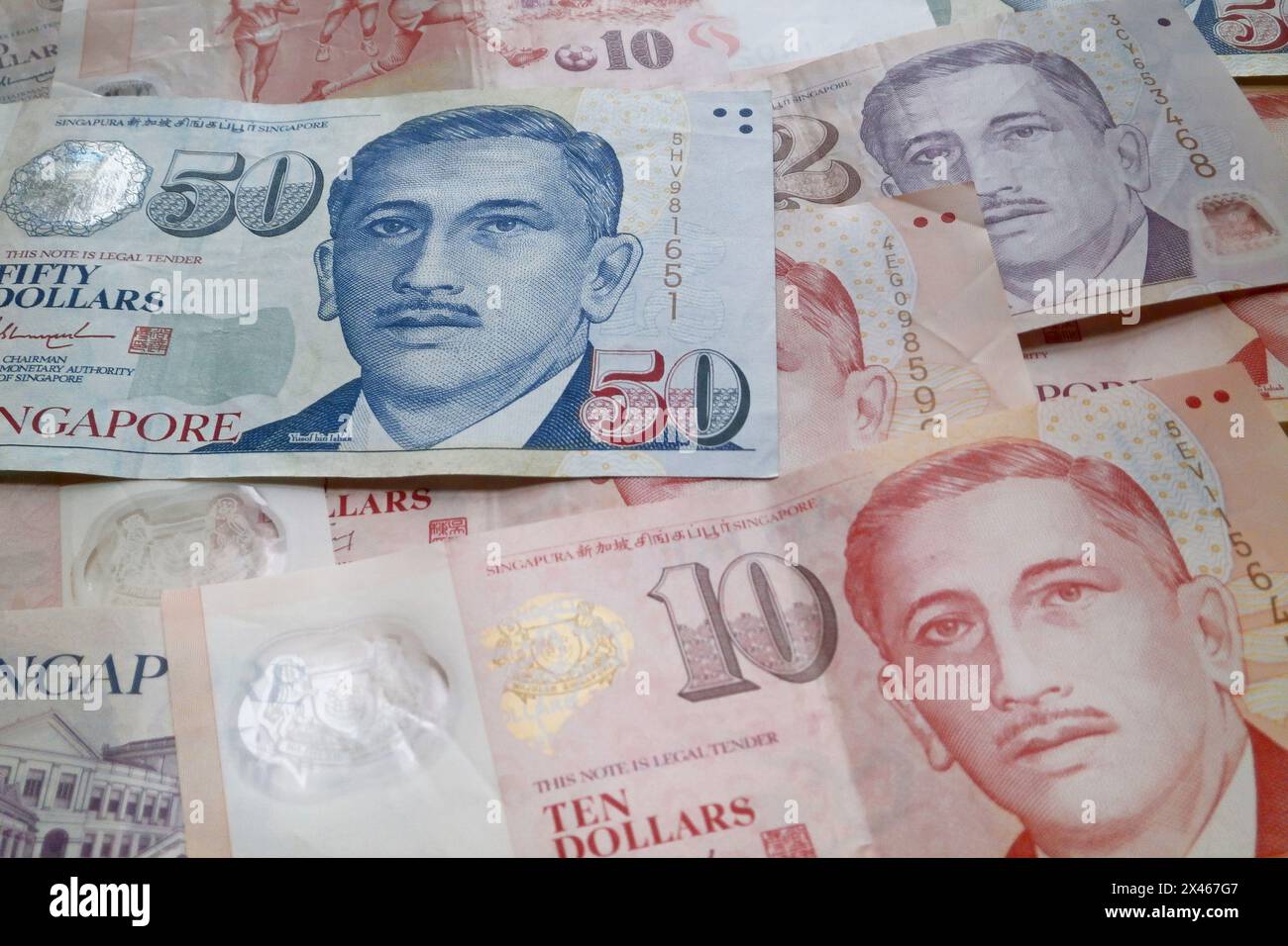 Stack of Singaporian dollar banknotes as background Stock Photo - Alamy