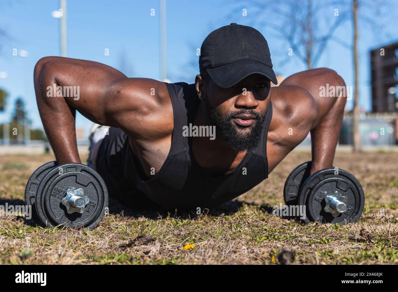 African american sportsman dumbbell exercising hi-res stock photography ...