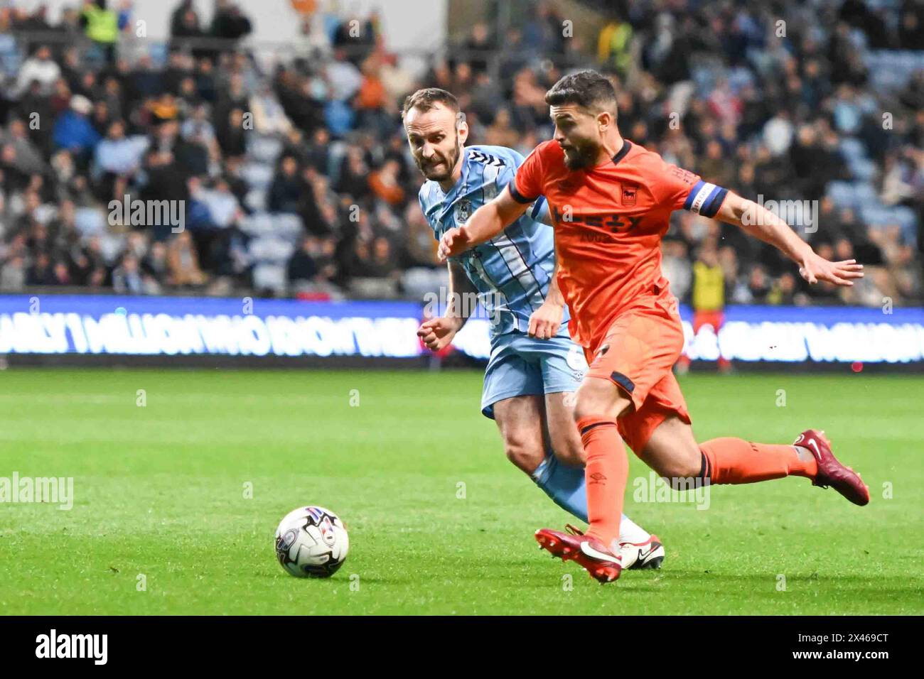 Sam Morsy (5 Ipswich Town) challenged by Liam Kelly (6 Coventry City ...