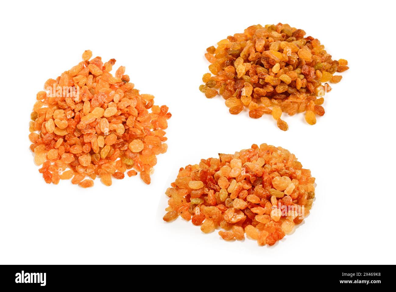 Golden raisins isolated on white background Stock Photo - Alamy