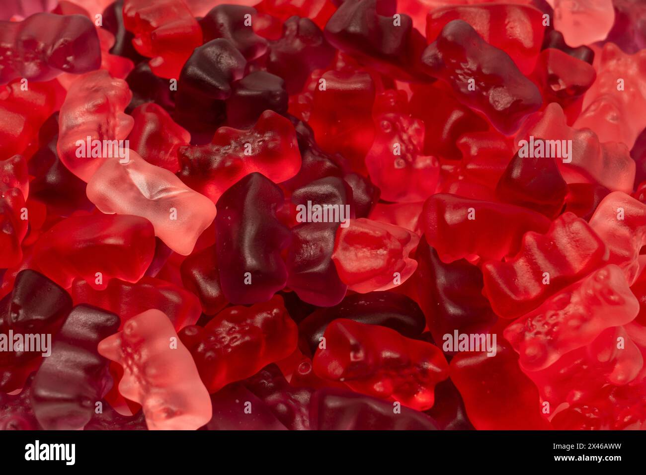 Assorted red gummy candies. Top view. Jelly bears Stock Photo - Alamy