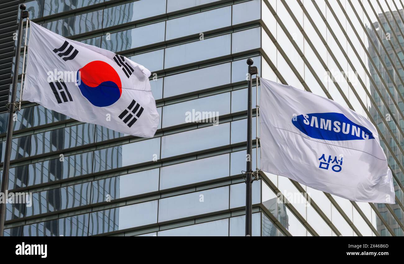 A South Korean national flag (L) with a Samsung Group flag (R) flutter ...