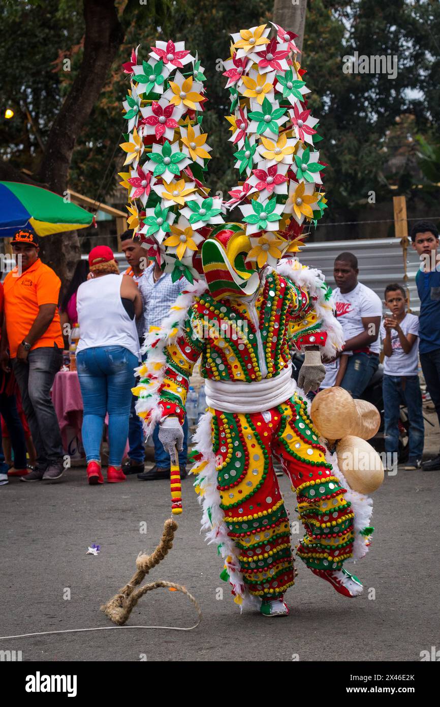 A Lechone costume from Santiago with a duck bill mask and horns in the ...