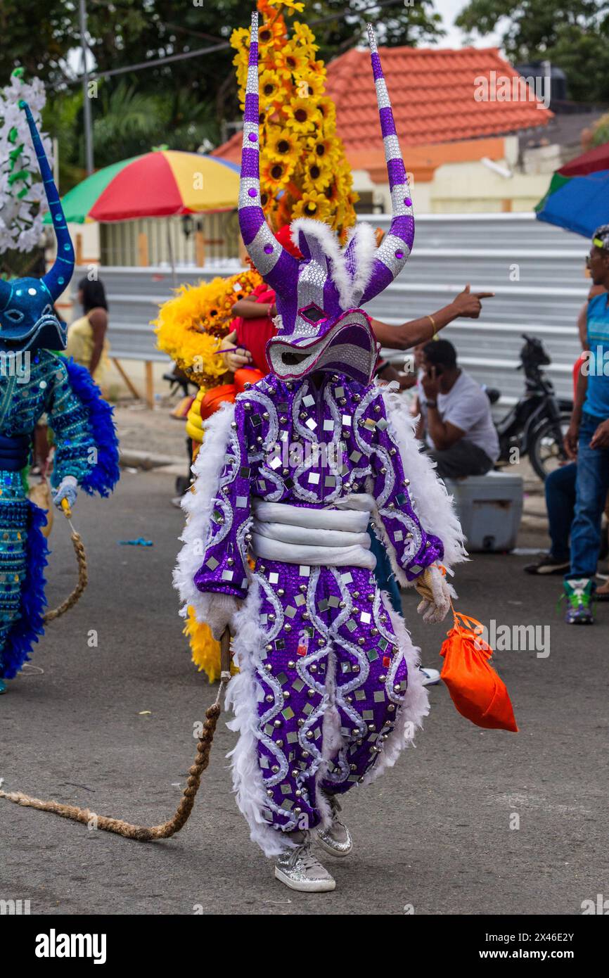 A Lechone costume from Santiago with a duck bill mask and horns in the ...