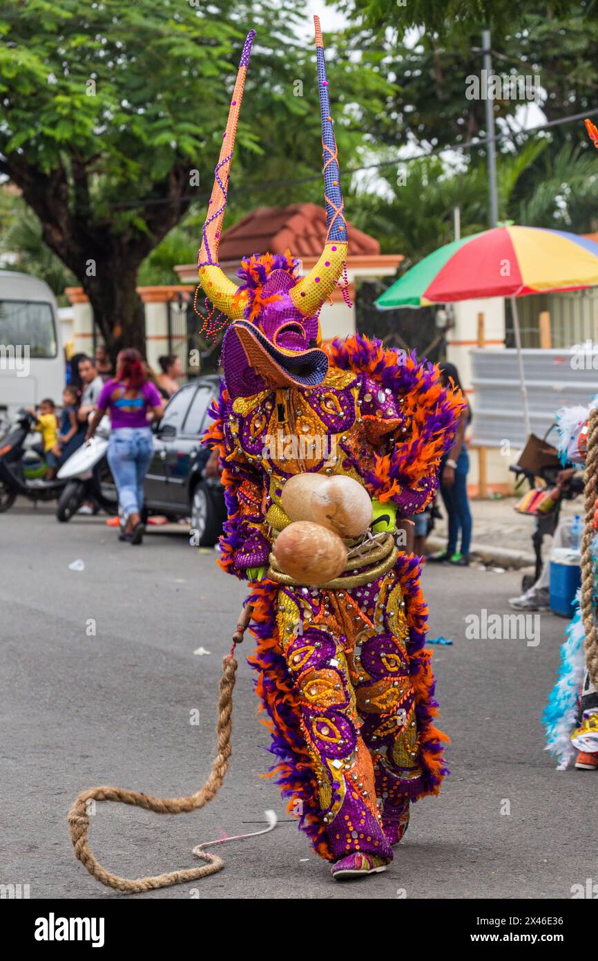 A Lechone costume from Santiago with a duck bill mask and horns in the ...