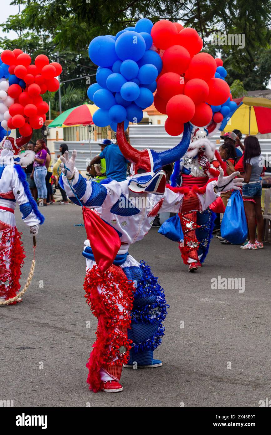 A Lechone costume from Santiago with a duck bill mask and horns in the ...