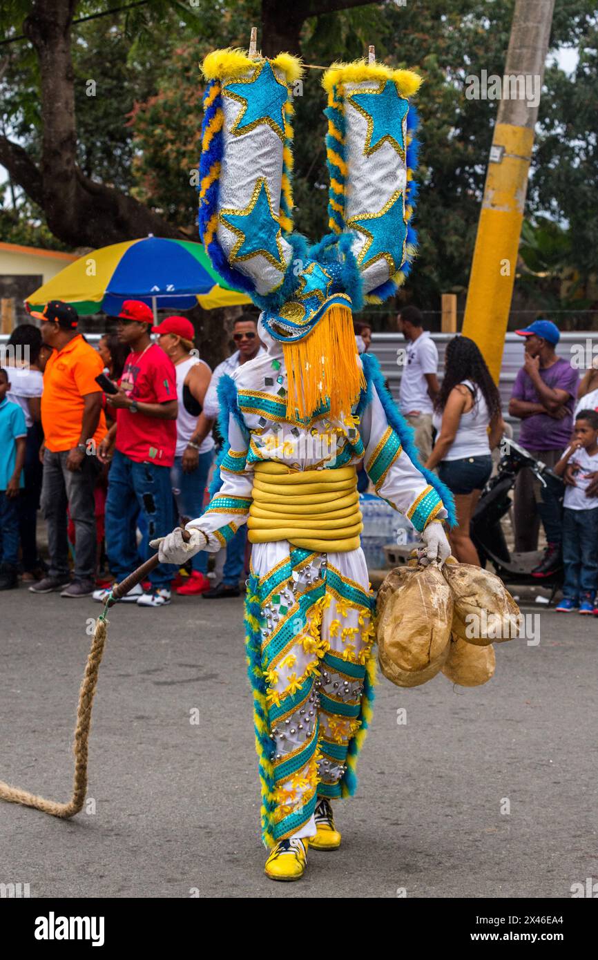 A Lechone costume from Santiago with a duck bill mask and horns in the ...