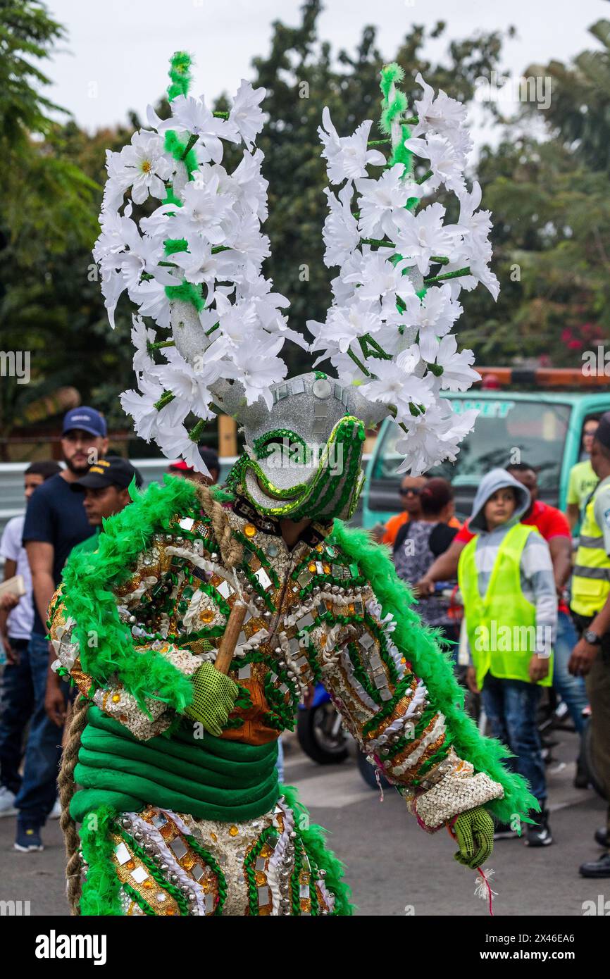A Lechone costume from Santiago with a duck bill mask and horns in the ...