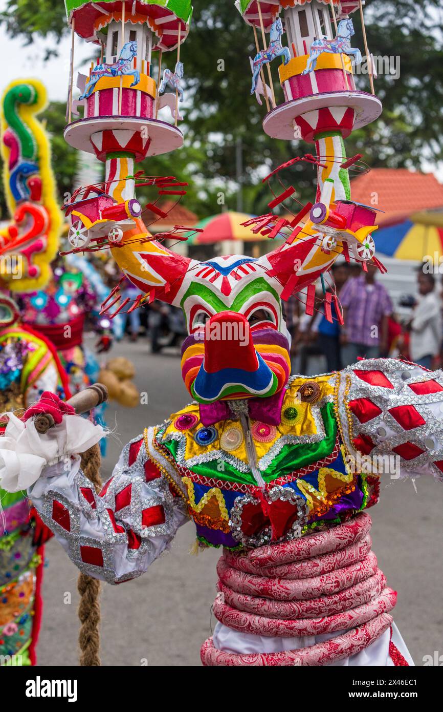A Lechone costume from Santiago with a duck bill mask and horns in the ...