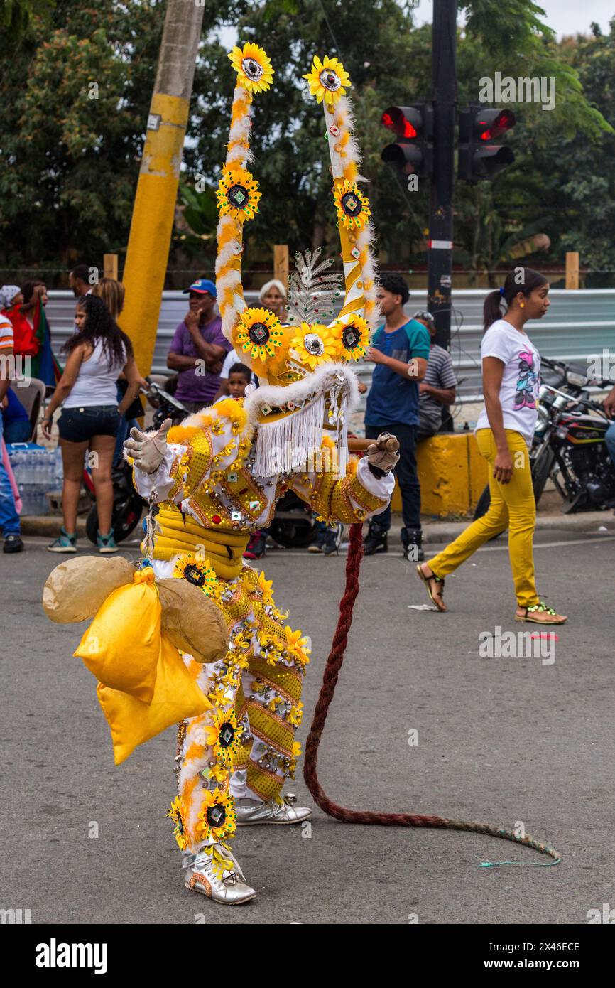 A Lechone costume from Santiago with a duck bill mask and horns in the ...
