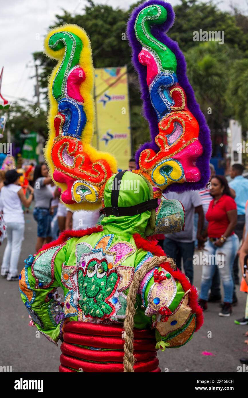 A Lechone costume from Santiago with a duck bill mask and horns in the ...