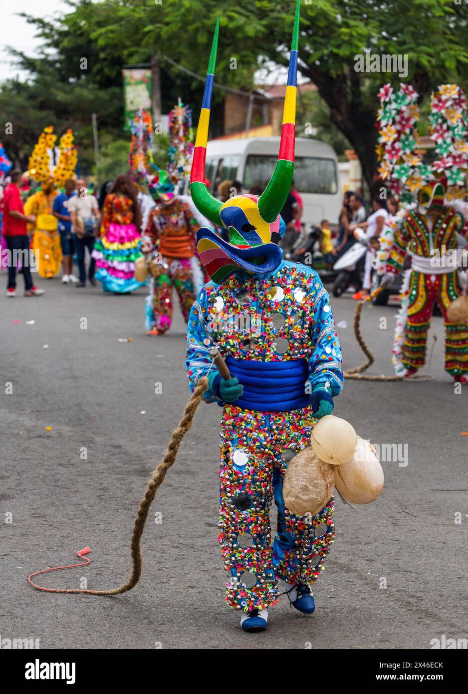 A Lechone costume from Santiago with a duck bill mask and horns in the ...
