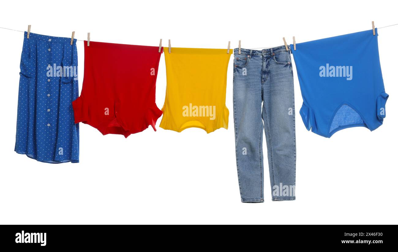 Different clothes drying on laundry line against white background Stock ...