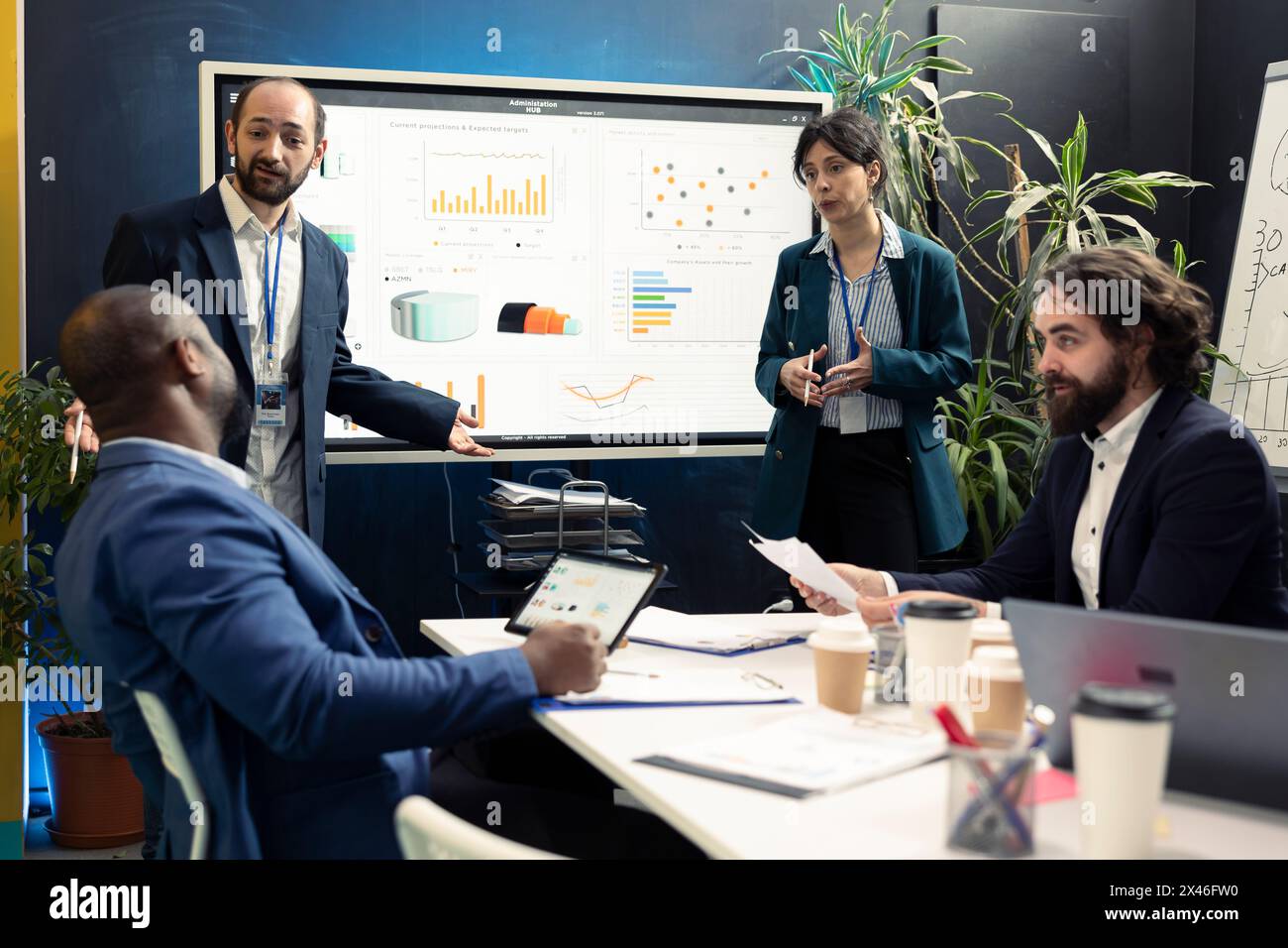 Public relations team working to improve the organization social media image, attending an ...