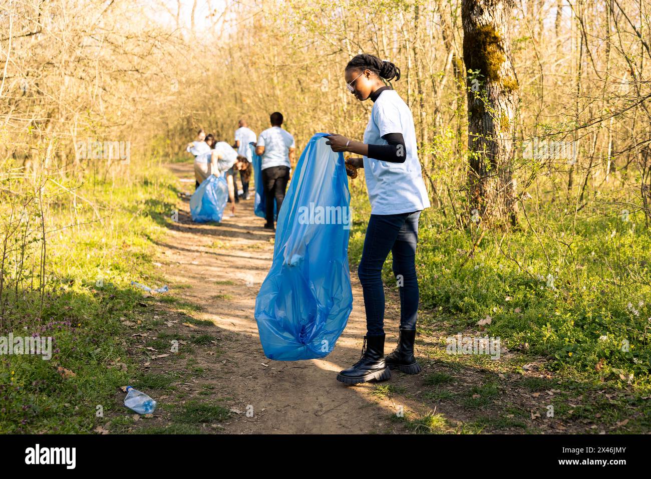 African people pick up waste hi-res stock photography and images - Alamy