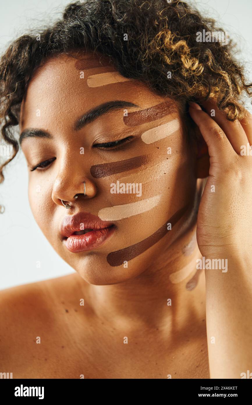 Appealing African American woman with makeup, smiling happily Stock ...