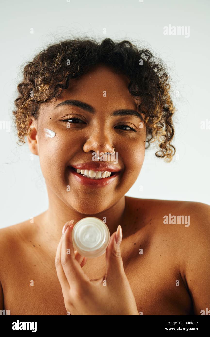 African american woman advertising cream hi-res stock photography and ...