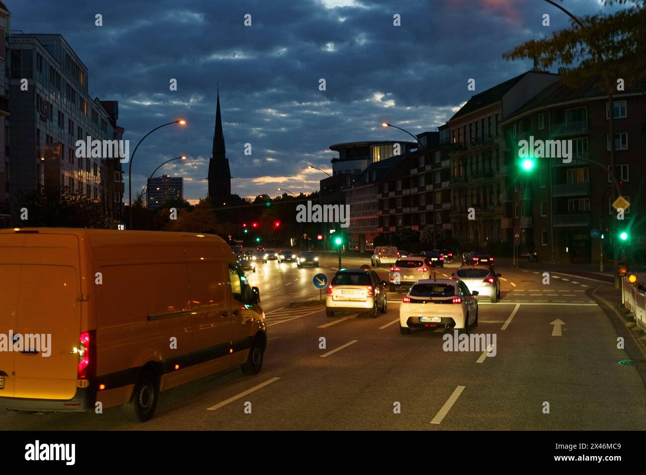 Hamburg, Germany - May 19, 2023: A city street at night filled with ...