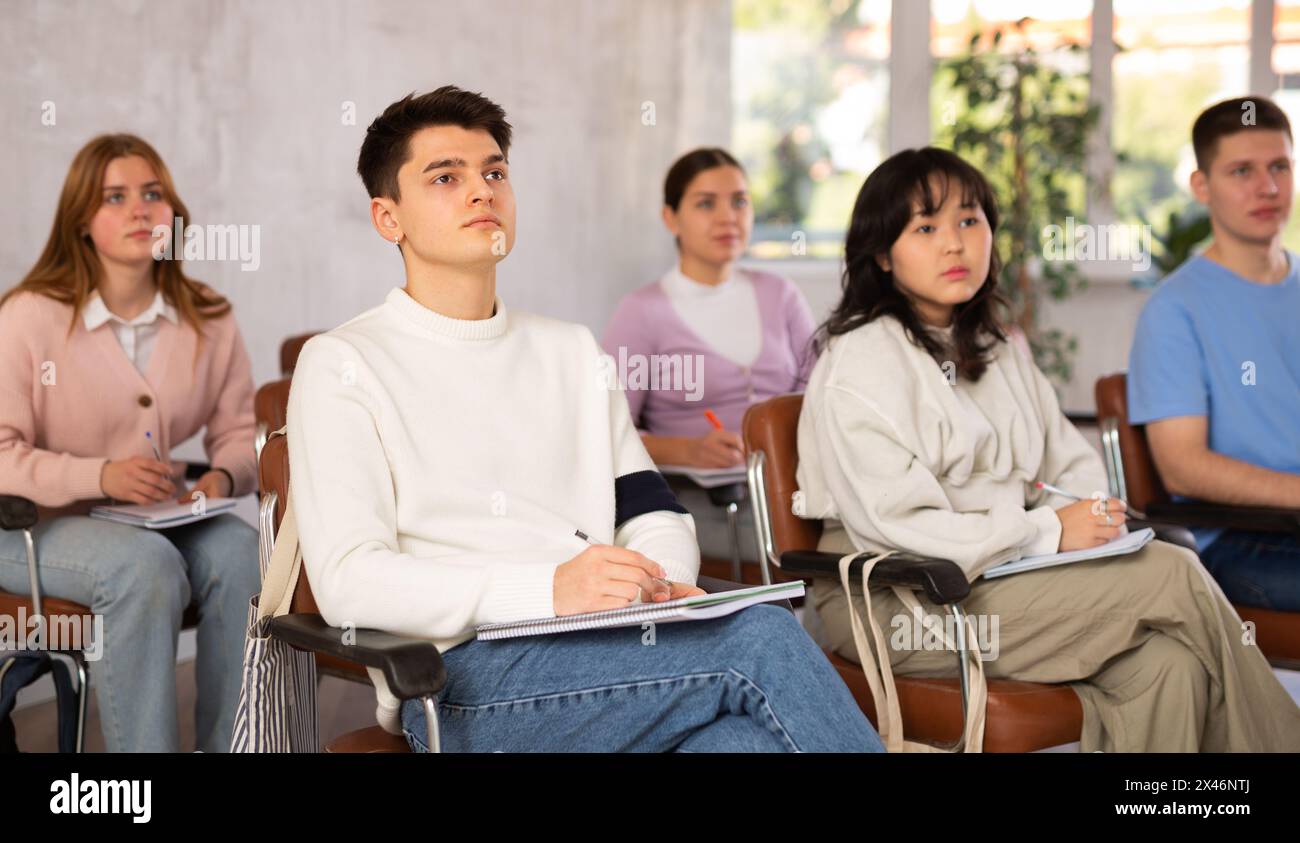 Lecture hall students active listening hi-res stock photography and ...