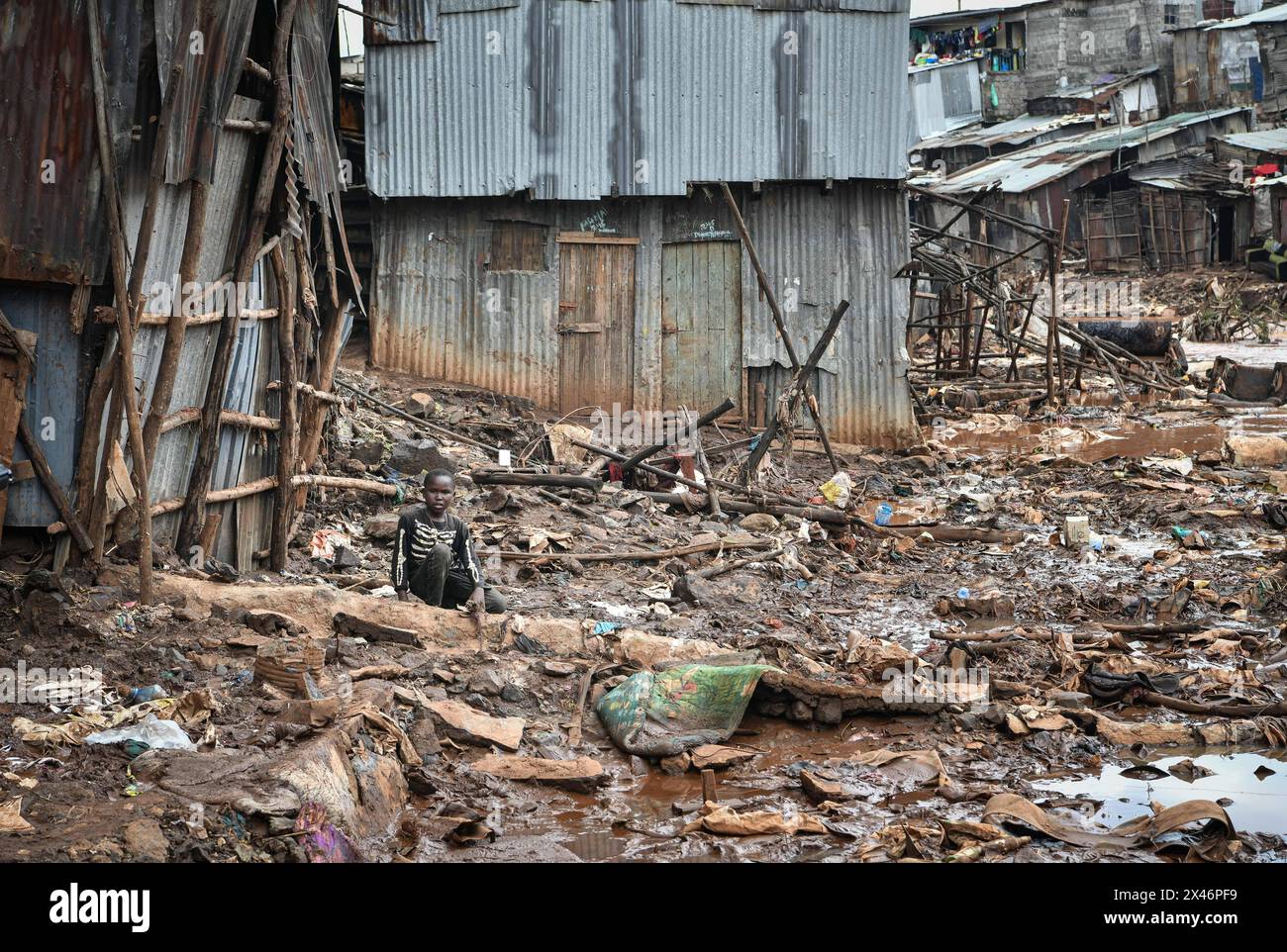 Nairobi, Kenya. 30th Apr, 2024. A boy is seen in a flood-affected area ...