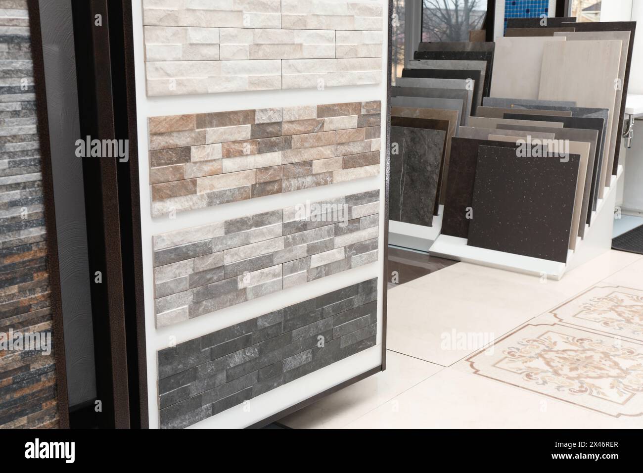 Many different samples of tiles on display in store Stock Photo - Alamy