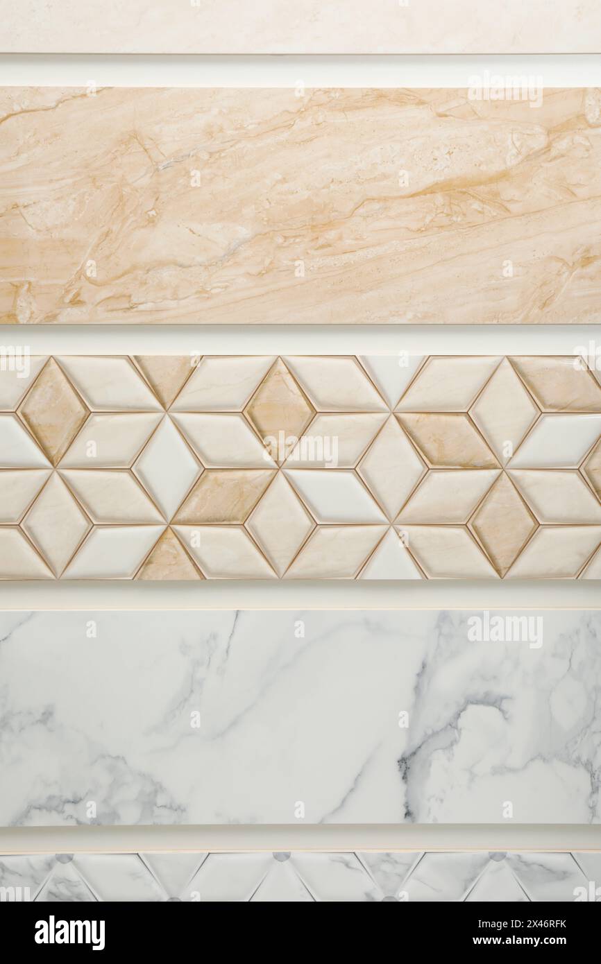 Samples of tiles with different patterns on display in store Stock ...