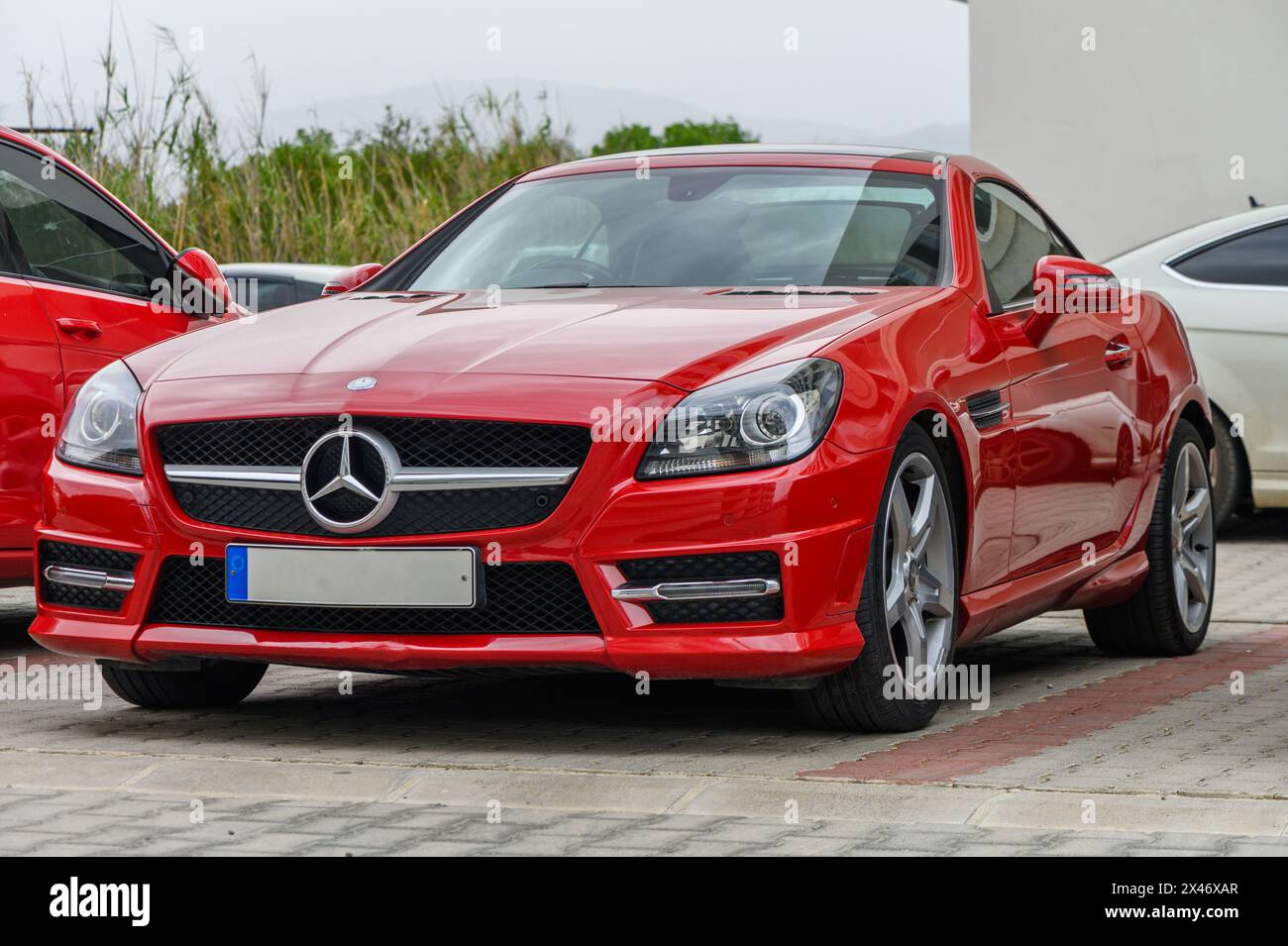 Gaziveren Cyprus 04.24.2024-red Mercedes Benz SLK 250 in the parking ...