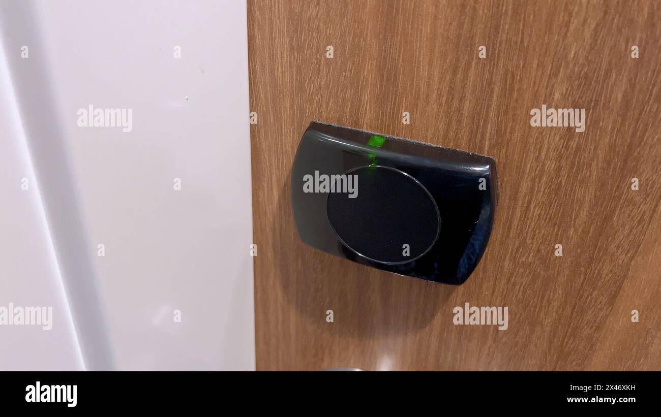 Guest Using Key Card to Access Hotel Room Stock Photo - Alamy