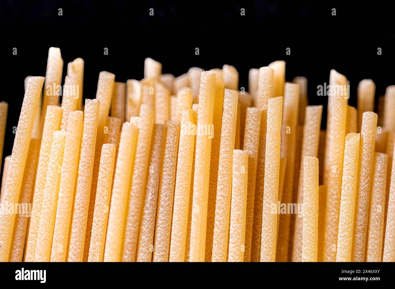 Background on kitchen of dry spaghetti ready to be cooked and prepare a ...