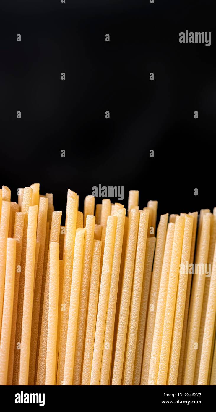 Background on kitchen of dry spaghetti ready to be cooked and prepare a ...