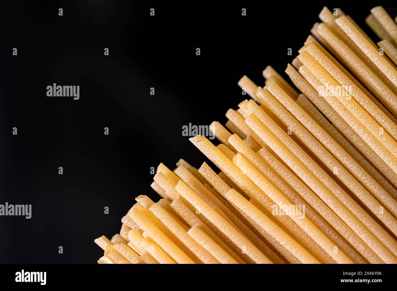 Background on kitchen of dry spaghetti ready to be cooked and prepare a ...