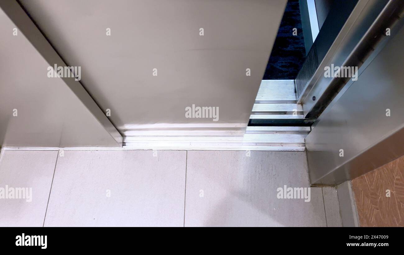 Elevator Threshold and Floor Detail Stock Photo - Alamy