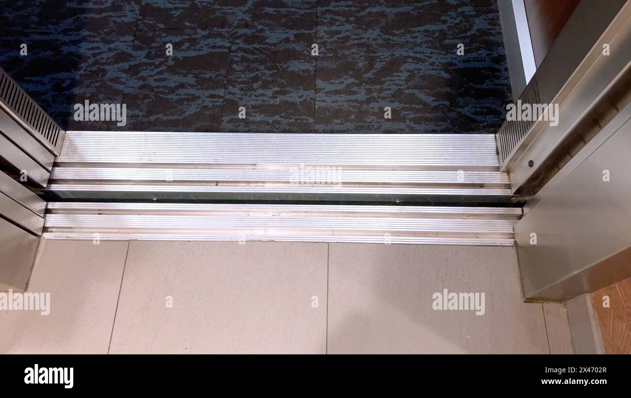 Elevator Threshold and Floor Detail Stock Photo - Alamy