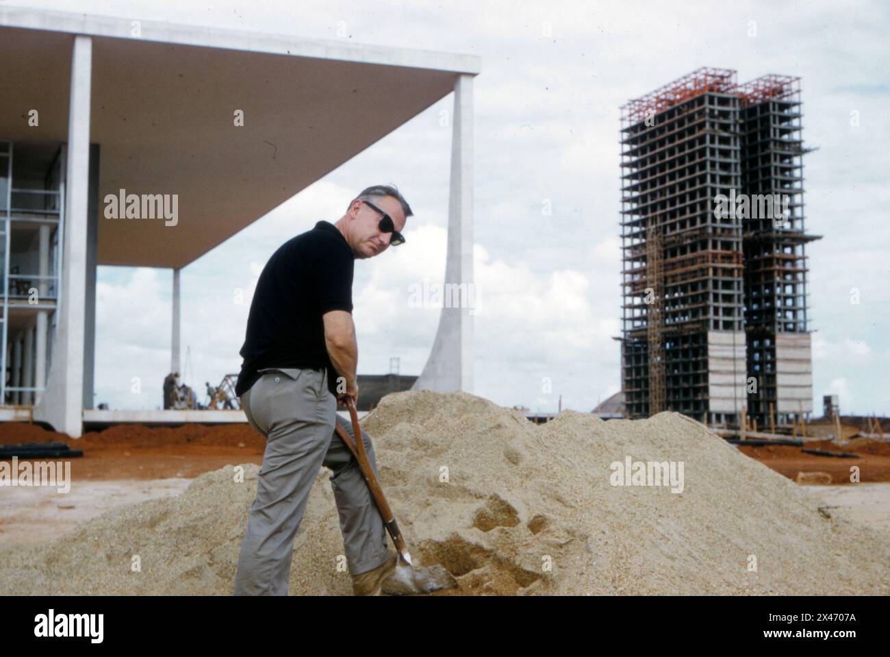 Brasilia under construction in 1959, writer Allen Hurlburt is shown ...