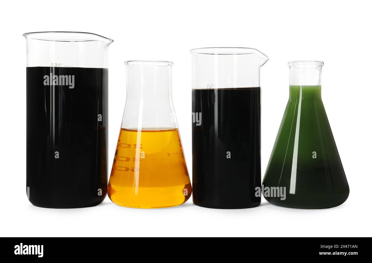 Beakers and flasks with different types of oil isolated on white Stock ...