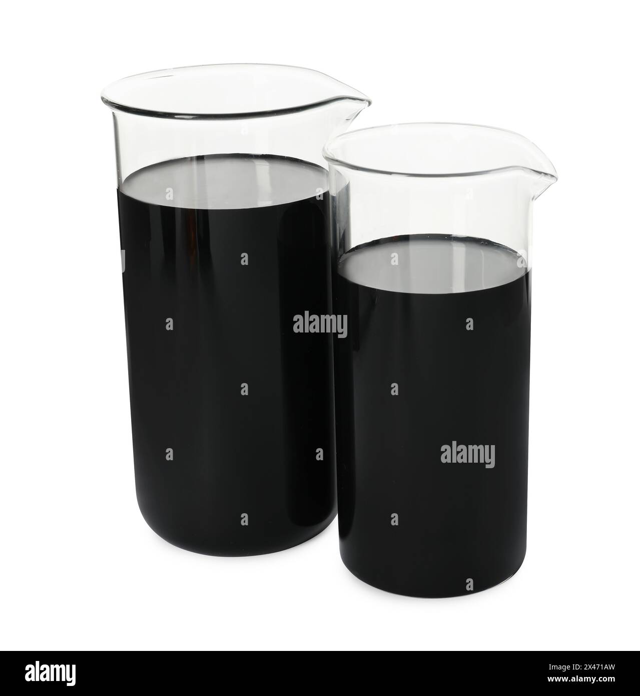 Beakers with black crude oil isolated on white Stock Photo - Alamy
