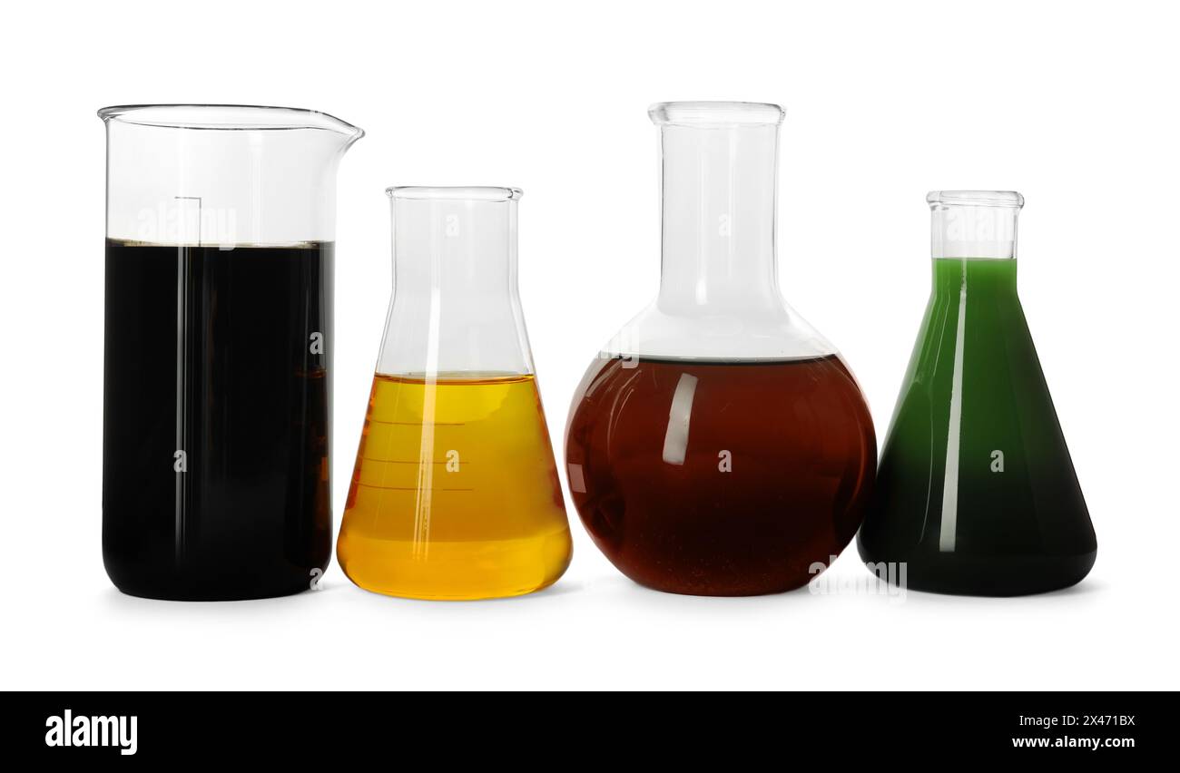 Beaker and flasks with different types of oil isolated on white Stock ...