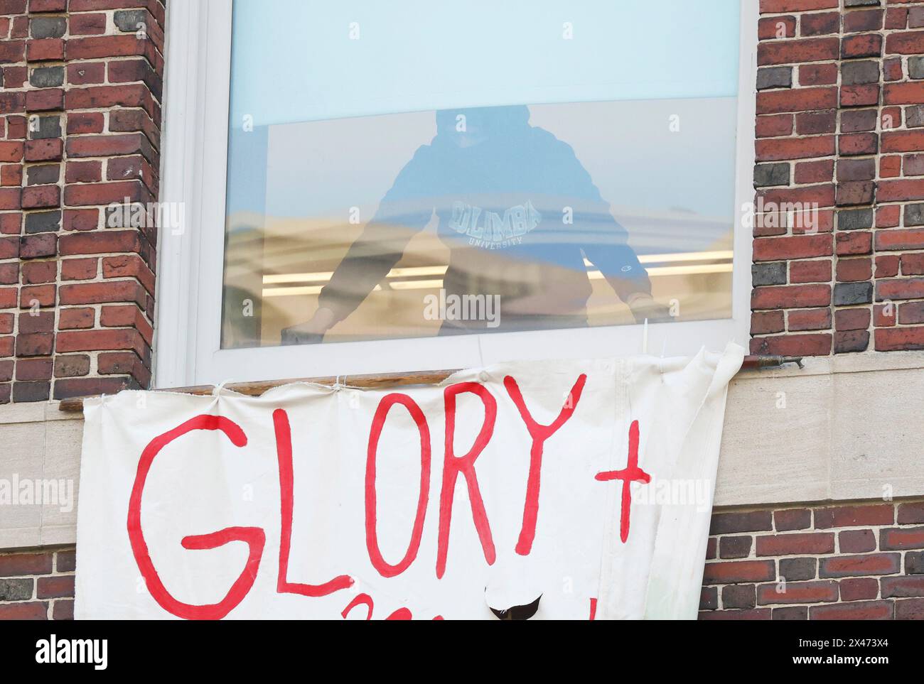 New York, United States. 30th Apr, 2024. Pro-Palestine protesters hang ...