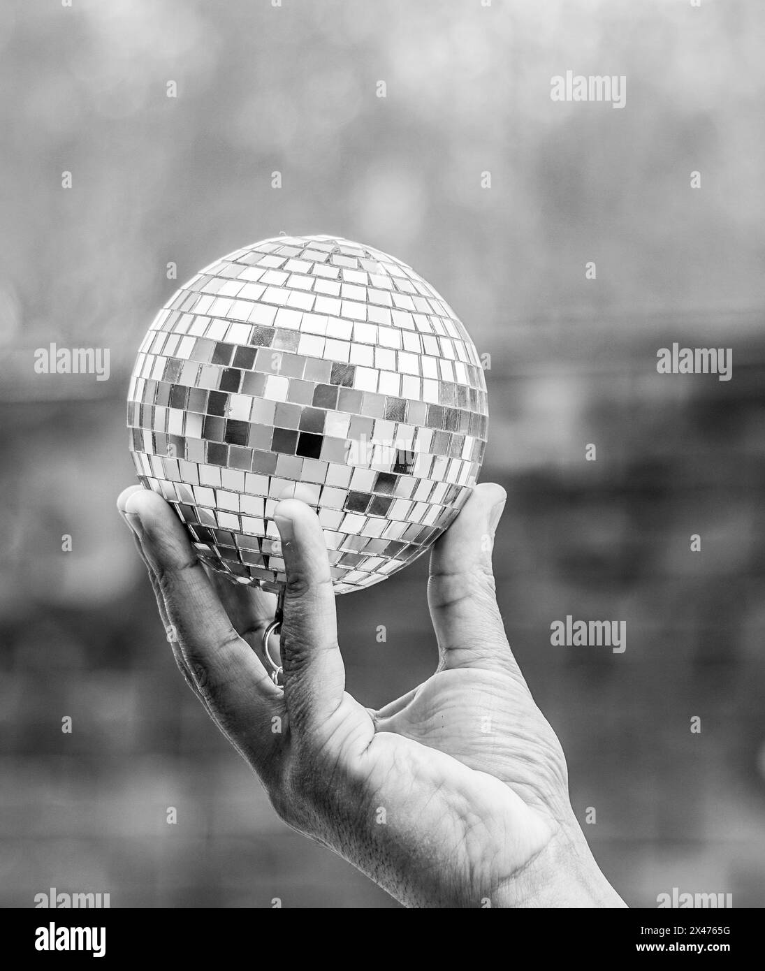 Hand holding toy Black and White Stock Photos & Images - Alamy